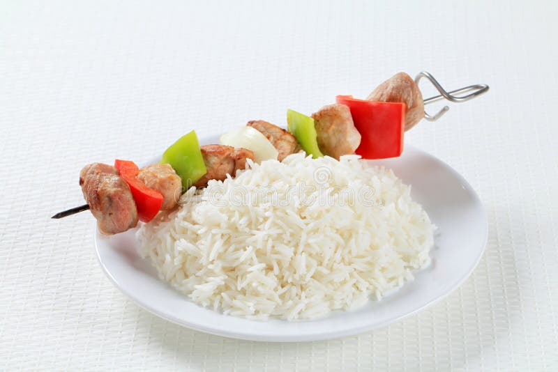 Shish kebabs with rice stock photo. Image of vegetable - 52106884