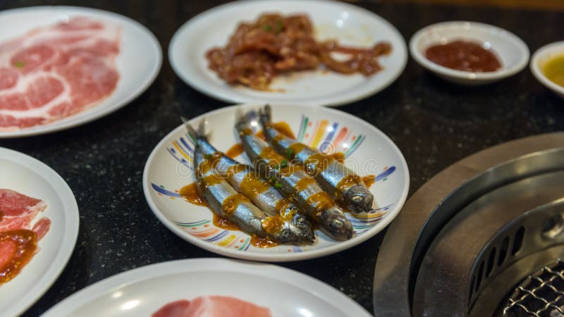 Shishamo Fish in Dish for Barbecue. Japanese Smelt Fish Stock Image ...
