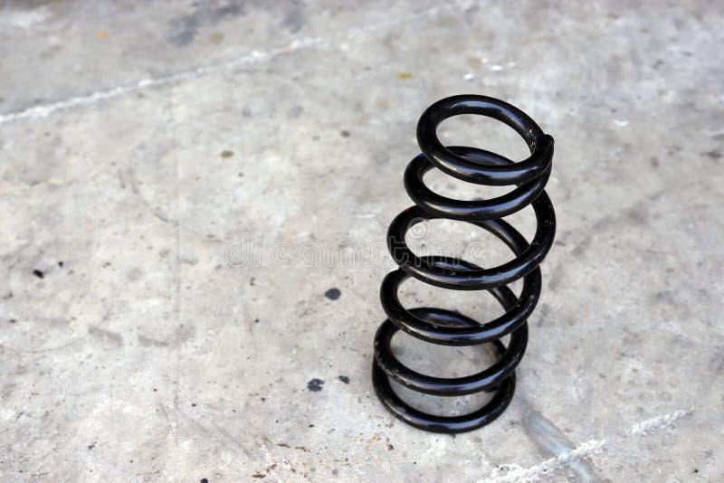 Shock Absorber and Spring on Floor. Stock Photo - Image of auto, motor ...