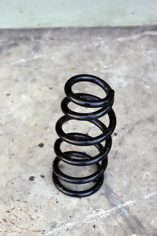 Shock Absorber and Spring on Floor. Stock Photo - Image of heavy ...