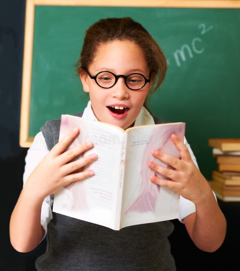 Shock, Reading and Child Student with Book in Classroom for Knowledge ...