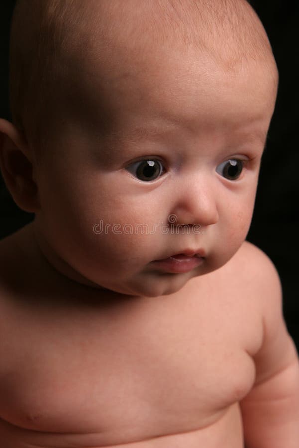 Shocked baby looking right stock image. Image of docile - 761889