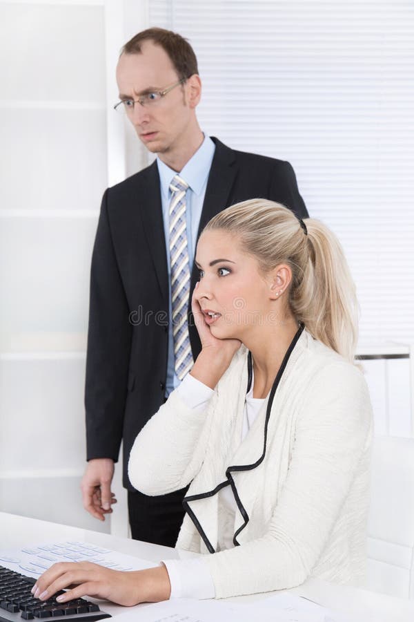 Shocked Business People Looking Depressed on Computer Received a Stock ...