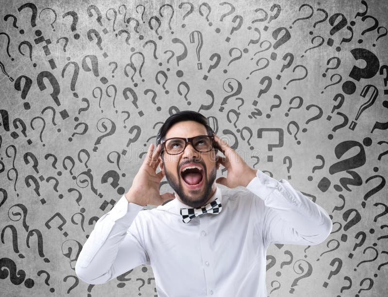 Shocked Businessman with Question Marks Stock Photo - Image of ...