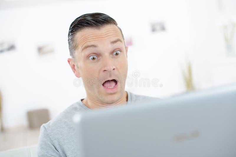 Shocked Businessman Working on Computer in Office Stock Photo - Image ...