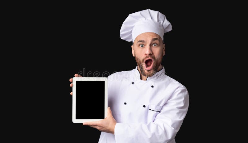 Shocked Chef Holding Digital Tablet Standing in Studio, Mockup Stock ...