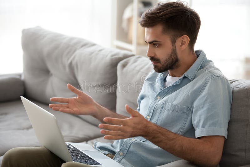 Shocked Frustrated Man Looking At Laptop Screen Bad News Receiving