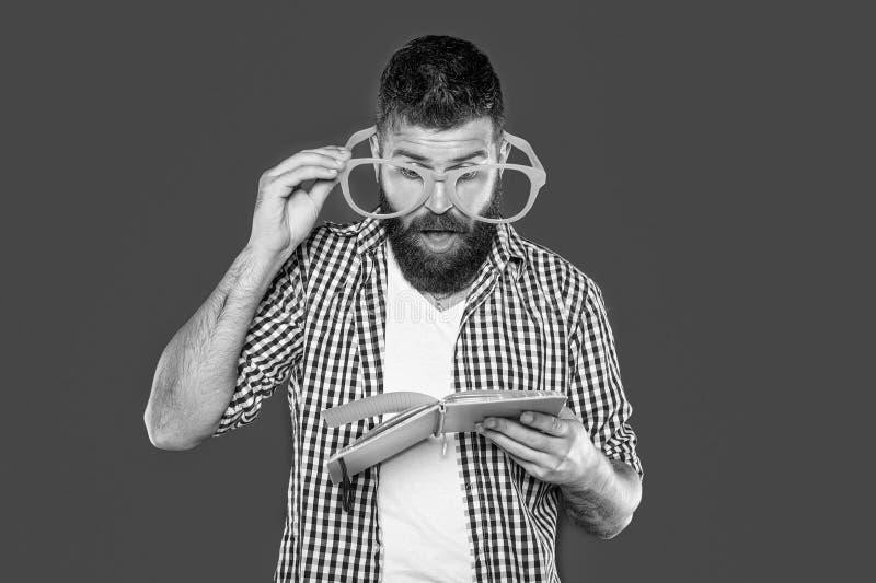 Shocked Funny Bearded Man In Party Glasses Read Book Stock Image