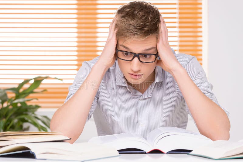 Shocked Male Student Working in Studio. Stock Image - Image of desk ...