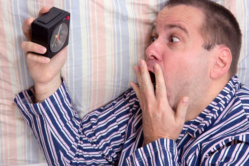 Shocked Man with Alarm Clock Stock Photo - Image of hold, adult: 87779908