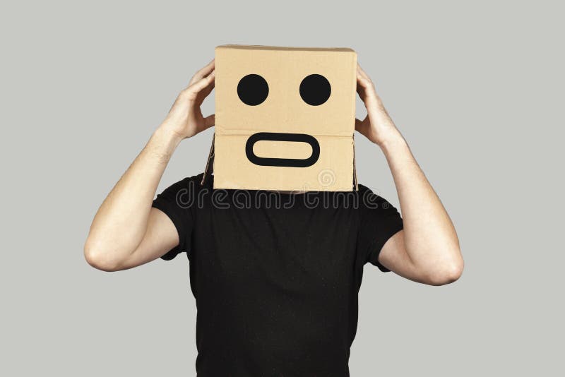 Shocked Man with a Box on His Head. Funny Scared Student is Afraid of ...