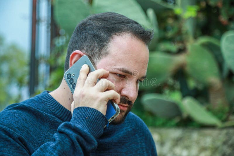 Shocked Man Hears Devastating News on Phone Stock Image - Image of ...