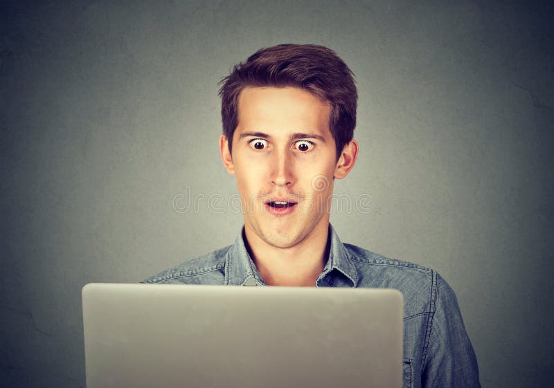 Shocked Man Looking at Laptop Stock Photo - Image of profile, person ...