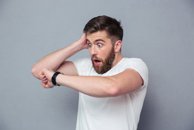 698 Young Shocked Man Looking Watch Stock Photos - Free & Royalty-Free ...