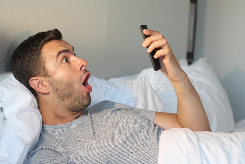 Shocked Man Reading Something on Cellphone Stock Photo - Image of cell ...