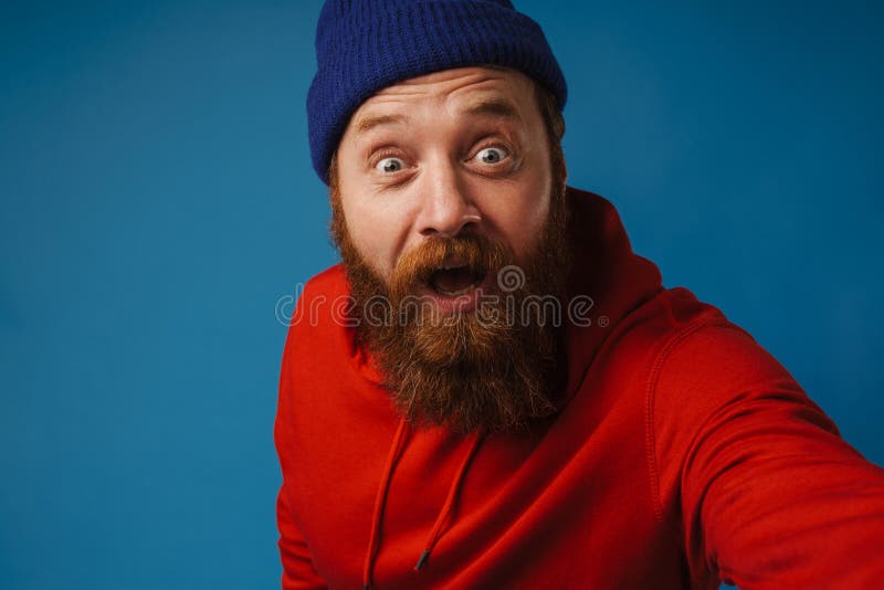 Shocked Man Screaming and Looking at Camera Isolated Over Blue Wall ...