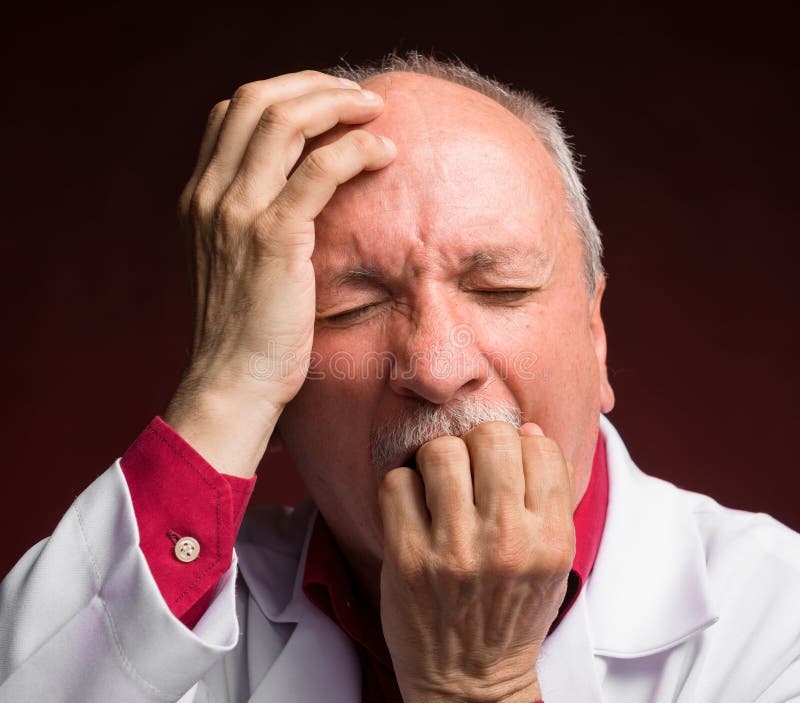 Shocked mature doctor stock image. Image of expression - 42830659