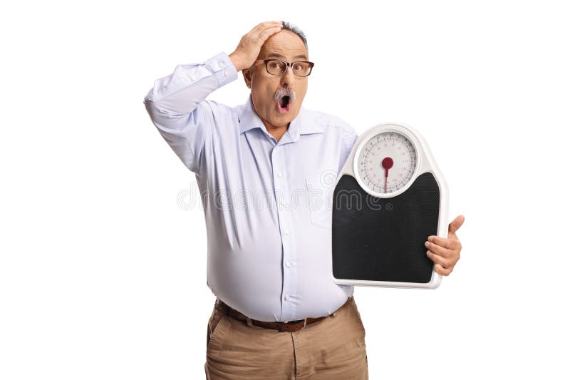 Shocked Mature Man Holding Weight Scale Stock Photos - Free & Royalty ...