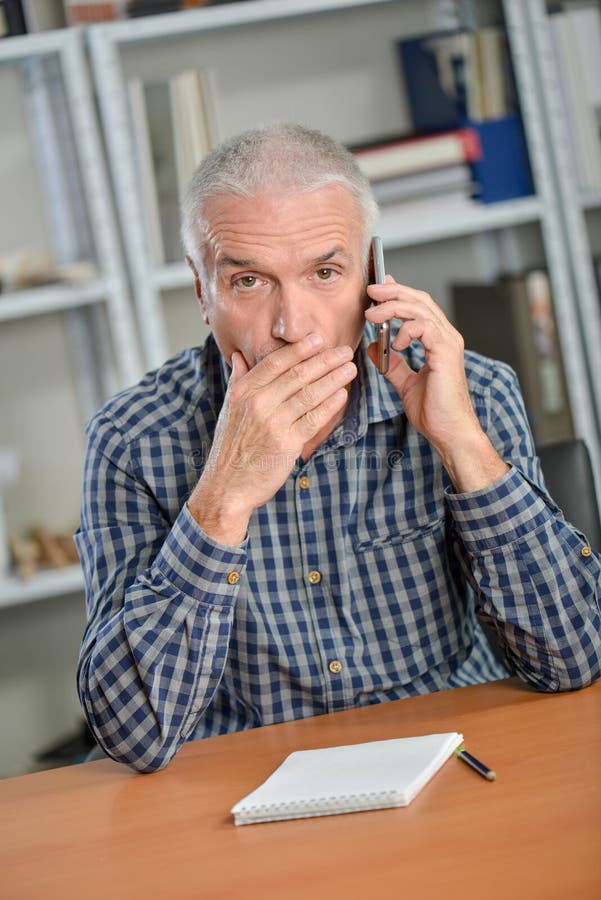 Shocked by phone call stock photo. Image of listening - 122448286
