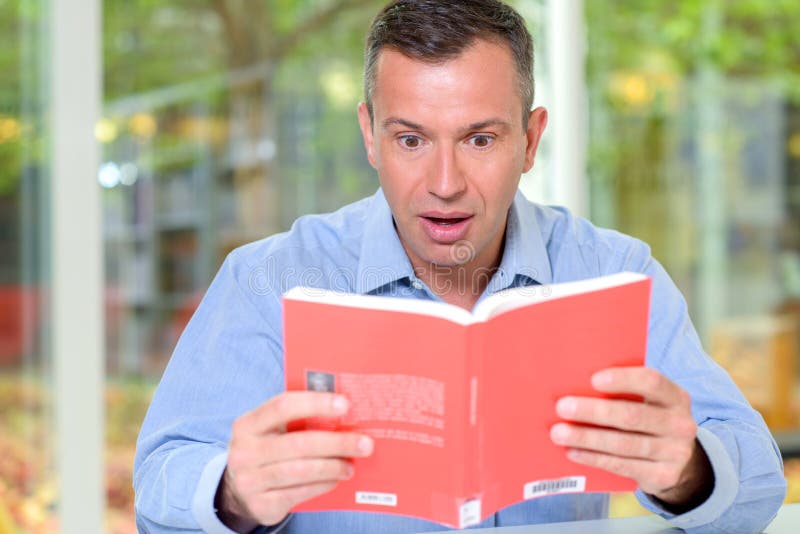 Shocked Reader Reading Book Stock Photo - Image of hobby, surprise ...