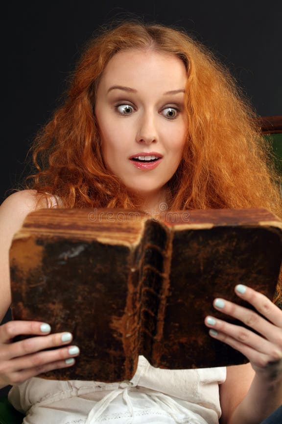 Shocked while Reading a Book Stock Photo - Image of student, book: 25362200
