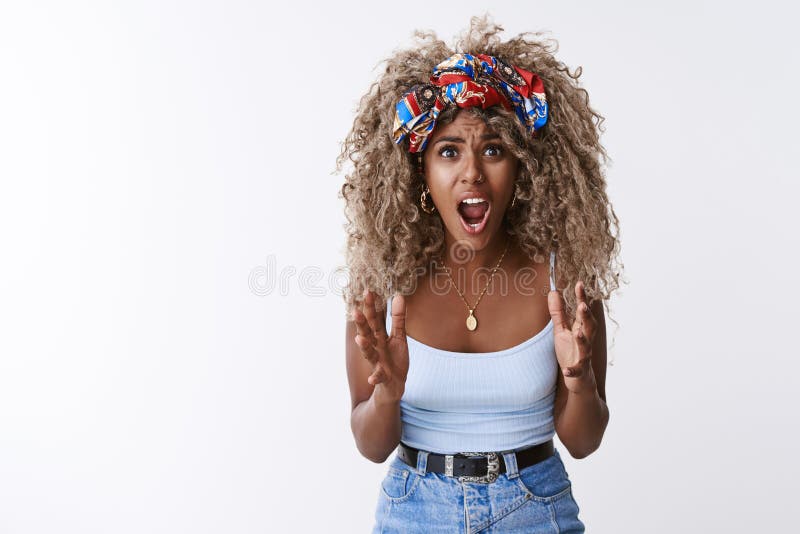 Shocked And Scared Worried Young Blond Curly Haired African American