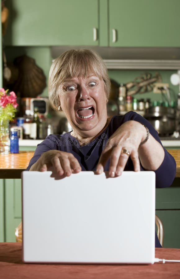 Shocked Senior Woman With A Laptop Computer Stock Photo - Image of ...
