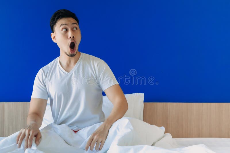 Shocked and Surprised Man Look at Empty Space Just Wake Up on the Bed ...