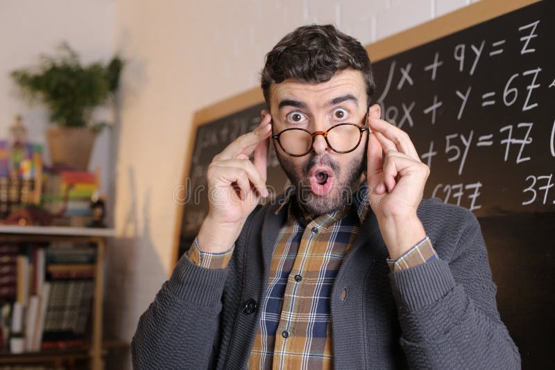 Shocked Teacher Holding Many Books and Screaming. Stock Image - Image ...