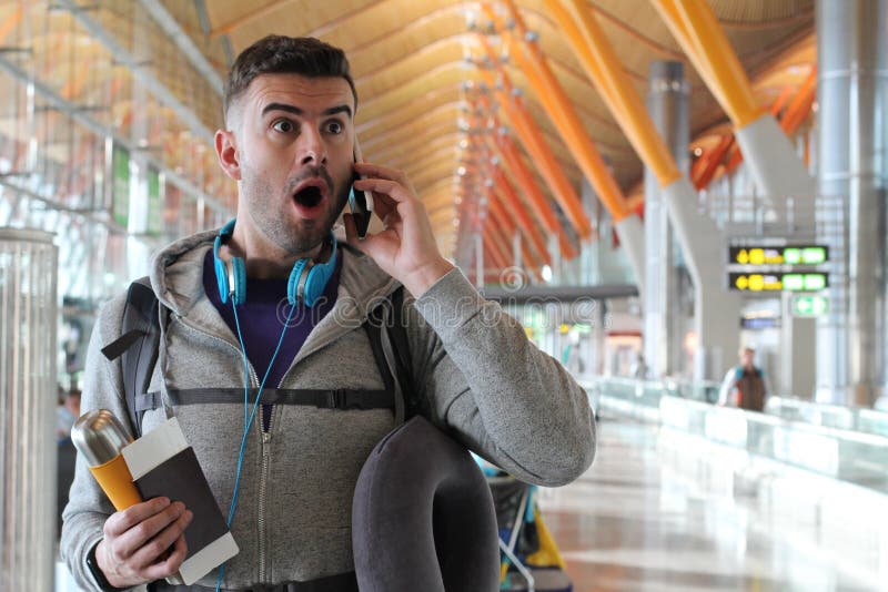 Shocked Traveler Getting an Unexpected Phone Call Stock Photo - Image ...