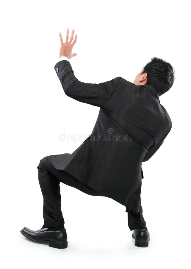 Businessman Pushing Something Heavy Pose Stock Photo - Image of ...