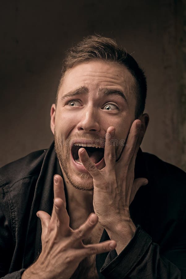 Shocked young man stock image. Image of grunge, background - 60770213
