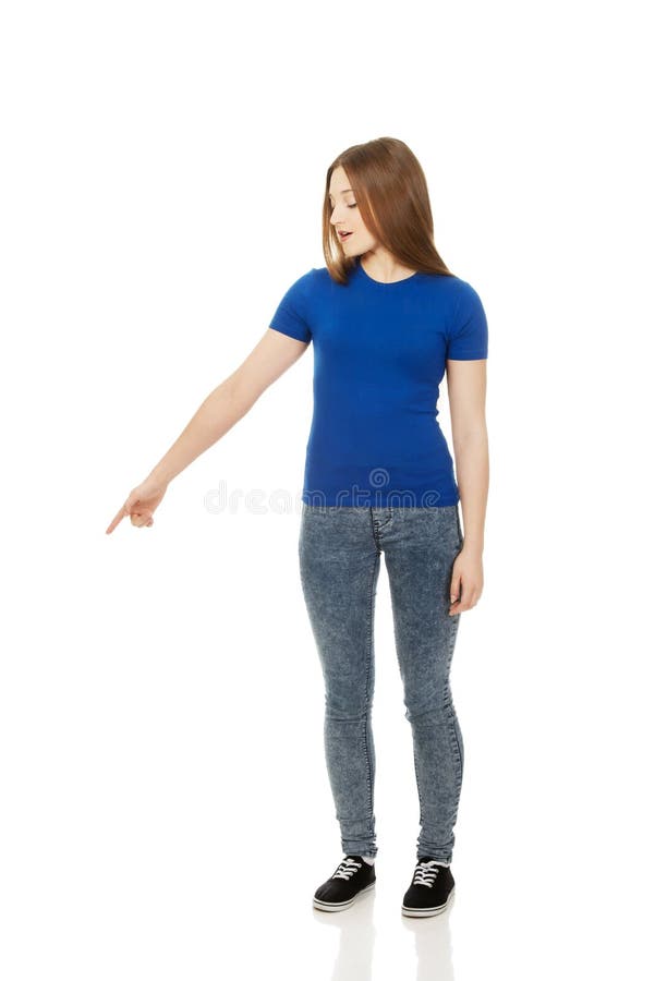 Shocked Young Woman Pointing Down. Stock Image - Image of presentation ...