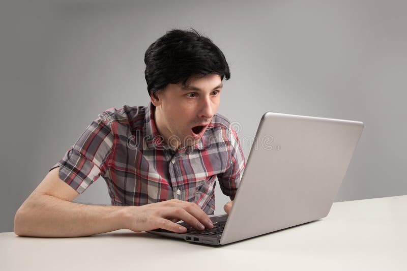 Shocking Man with Laptop Computer Stock Photo - Image of isolated ...