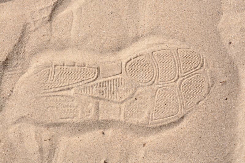 Shoe foot print on sand stock photo. Image of boots, mark - 33505338