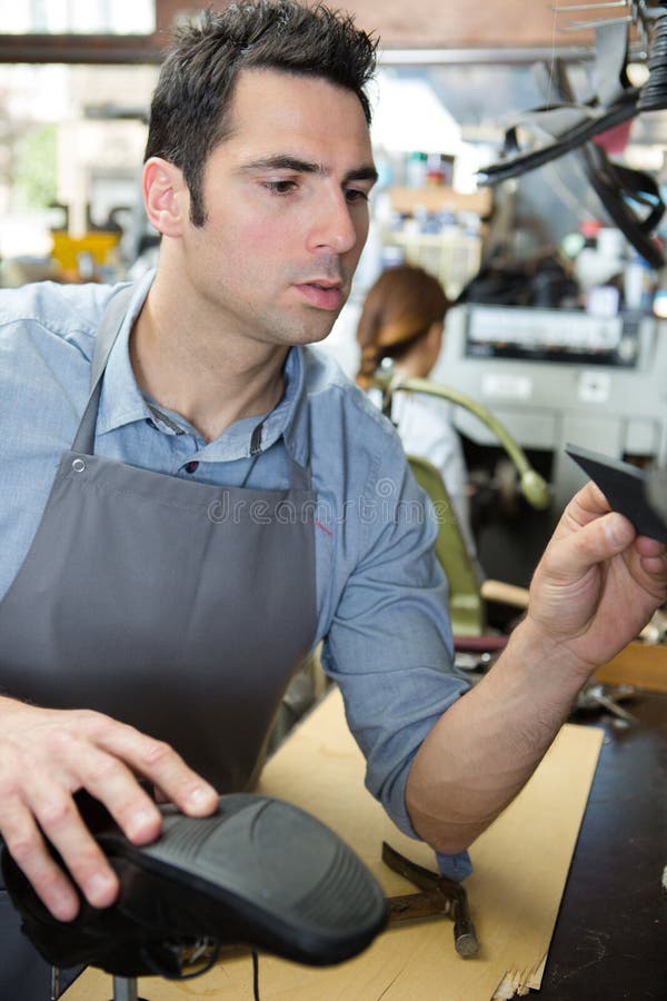 Shoe maker at work stock image. Image of workshop, fashion - 259958585
