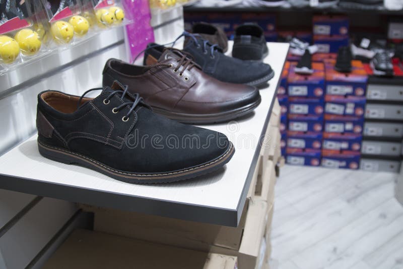 A Shoe Store. Shoes on the Store Counter Stock Photo - Image of store ...