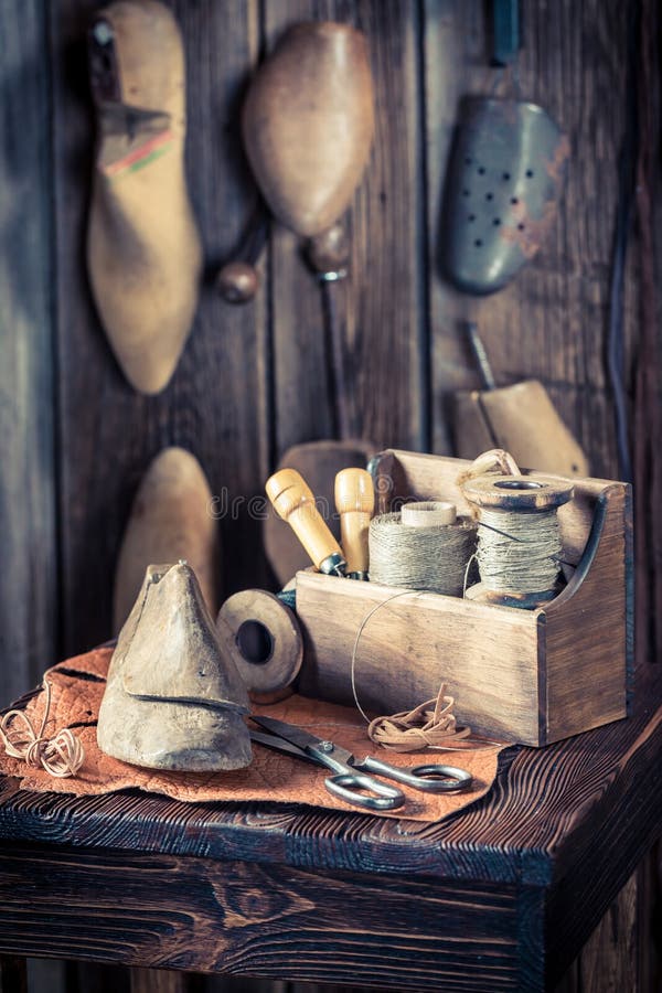 Vintage Shoemaker Workshop with Leather and Tools Stock Image - Image ...