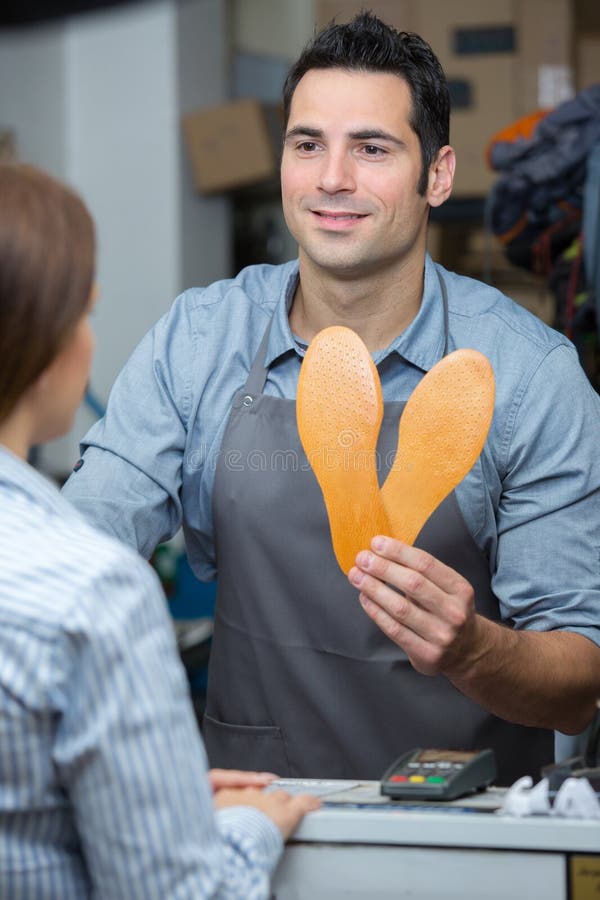 Shoemaker Holding Shoe Soles in Workshop Stock Photo - Image of ...