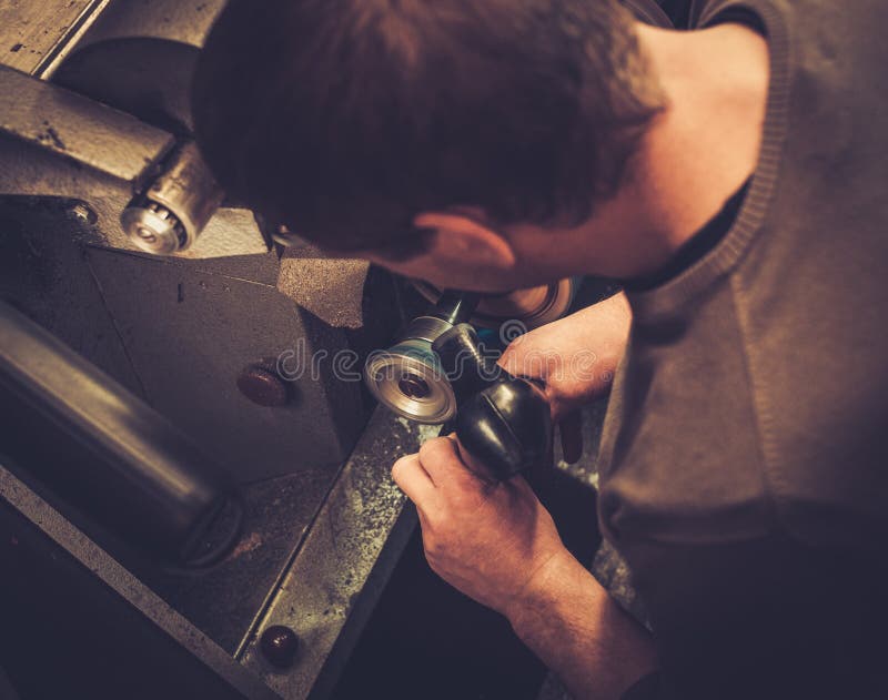 Shoemaker Performs Shoes in Studio Craft Grinder Machine. Stock Photo ...
