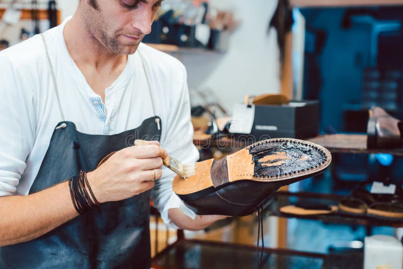 Shoemaker Putting Glue on Sole of a Shoe Stock Image - Image of working ...