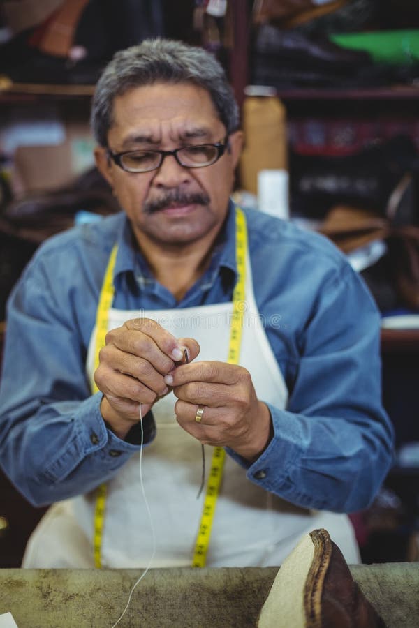 Shoemaker Putting Glue on Sole of a Shoe Stock Image - Image of apron ...