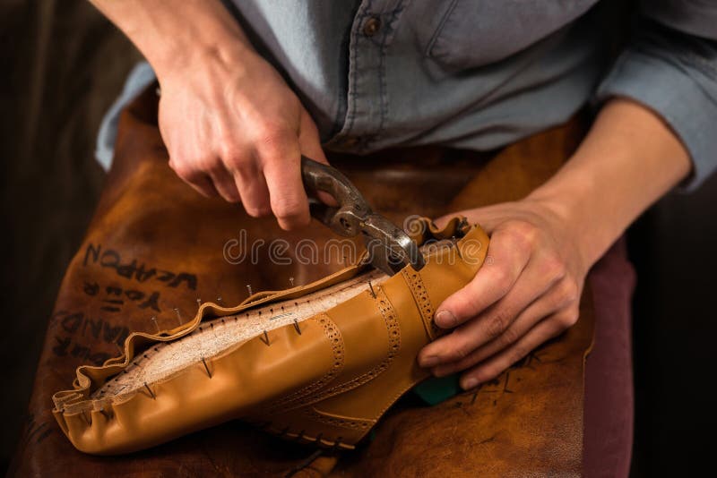 Shoemaker Sitting in Workshop Making Shoes Stock Image - Image of ...