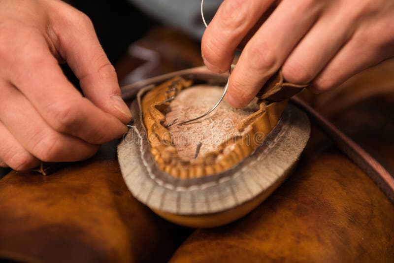 Shoemaker Sitting in Workshop Making Shoes Stock Photo - Image of ...