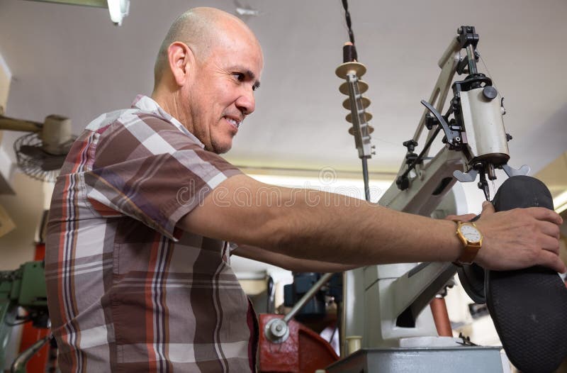 Shoemaker Stitching Shoes on Leather Sewing Machine Stock Photo - Image ...
