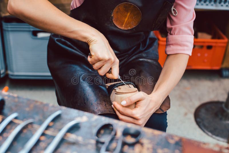 Shoemaker Working on the Frame of a Shoe Stock Image - Image of woman ...