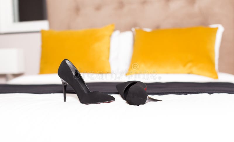Shoes on bed stock photo. Image of beautiful, adult, high - 68498154