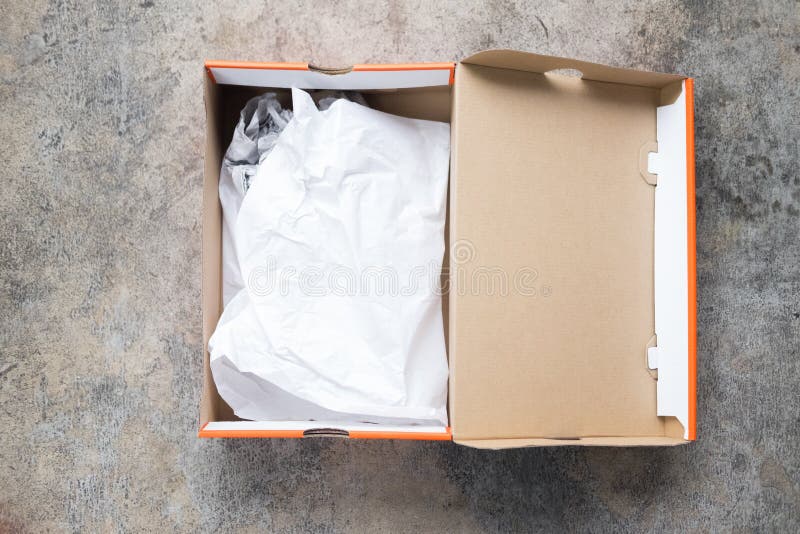 Shoes Packaging Cardboard Box with Crumpled Wrapping Paper Stock Photo ...