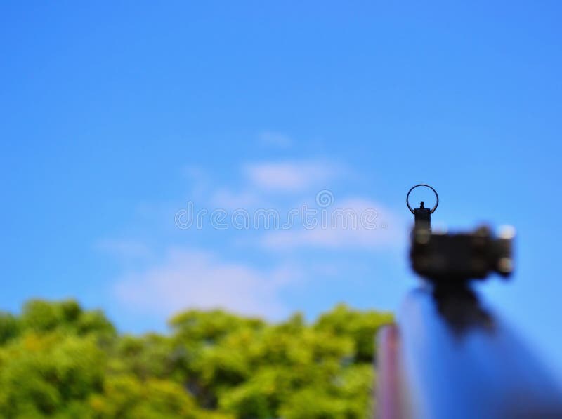 Shoot for the sky stock image. Image of weapon, concept - 20944823