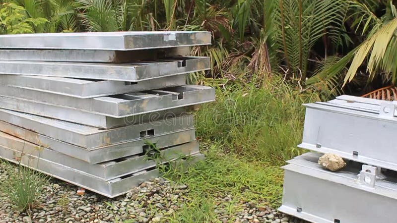 Shoot of the Square Bar Steel with a Silver Coated Paint Pile Using in ...